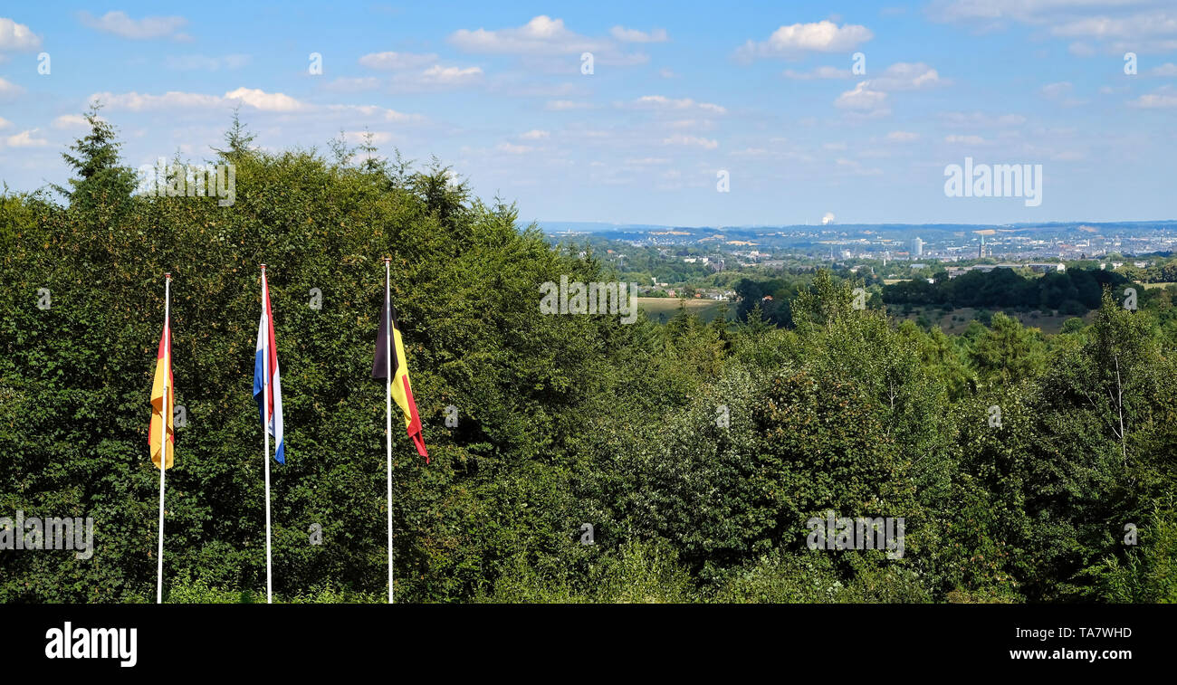 Flags from Netherlands, Belgium and Germany on three country border in ...
