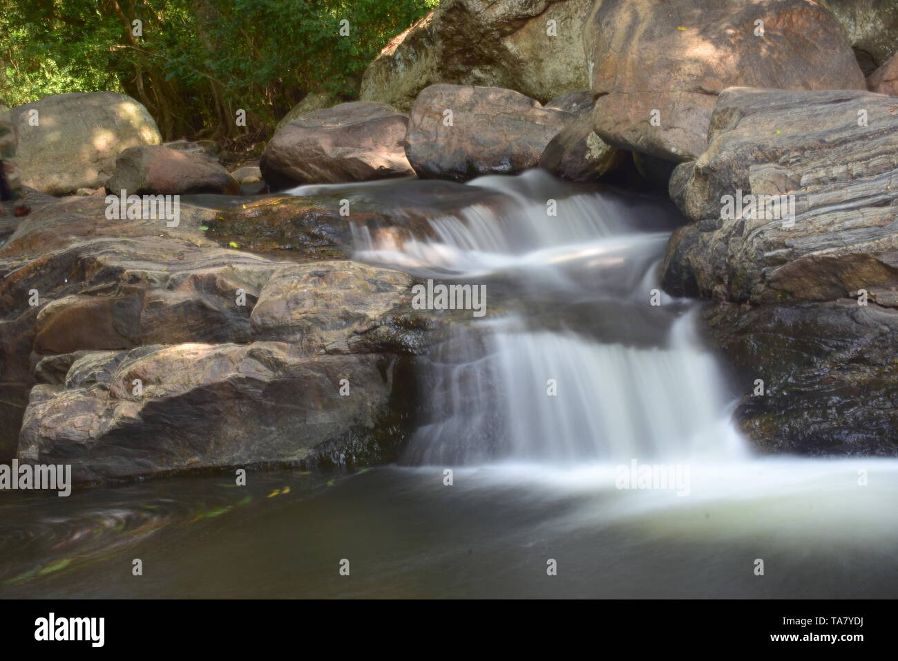 Kumbakkarai Water Falls - The Pambar river Stock Photo - Alamy