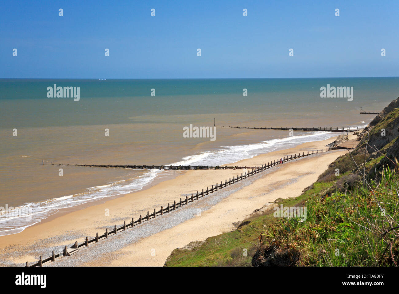A view of the beach and sea defences from the cliff top on the North ...