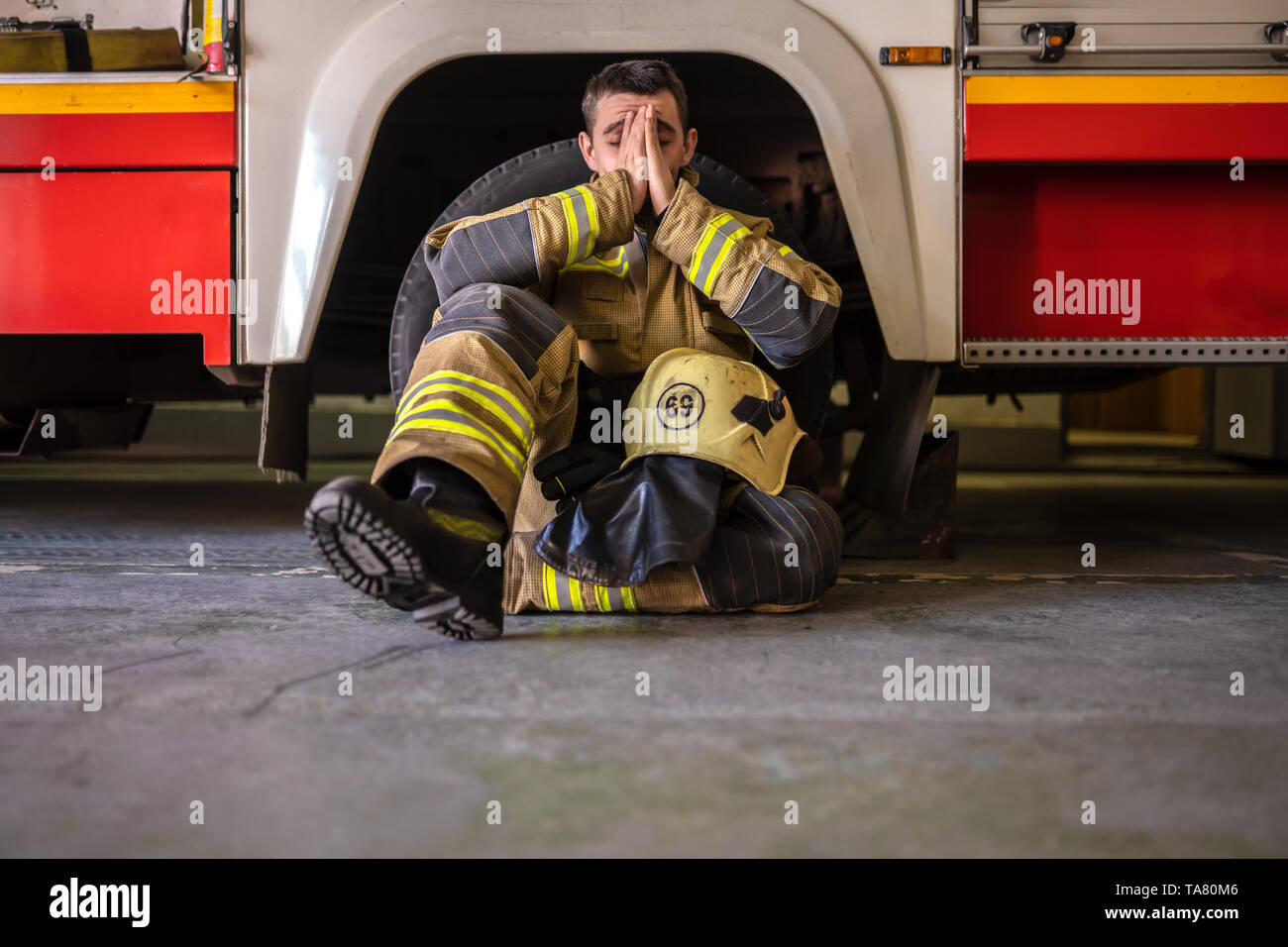 Tired fireman hi-res stock photography and images - Alamy