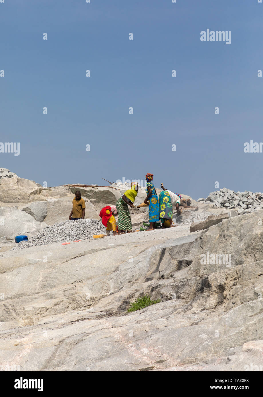 African people working in a granite quarry, Savanes district, Shienlow ...