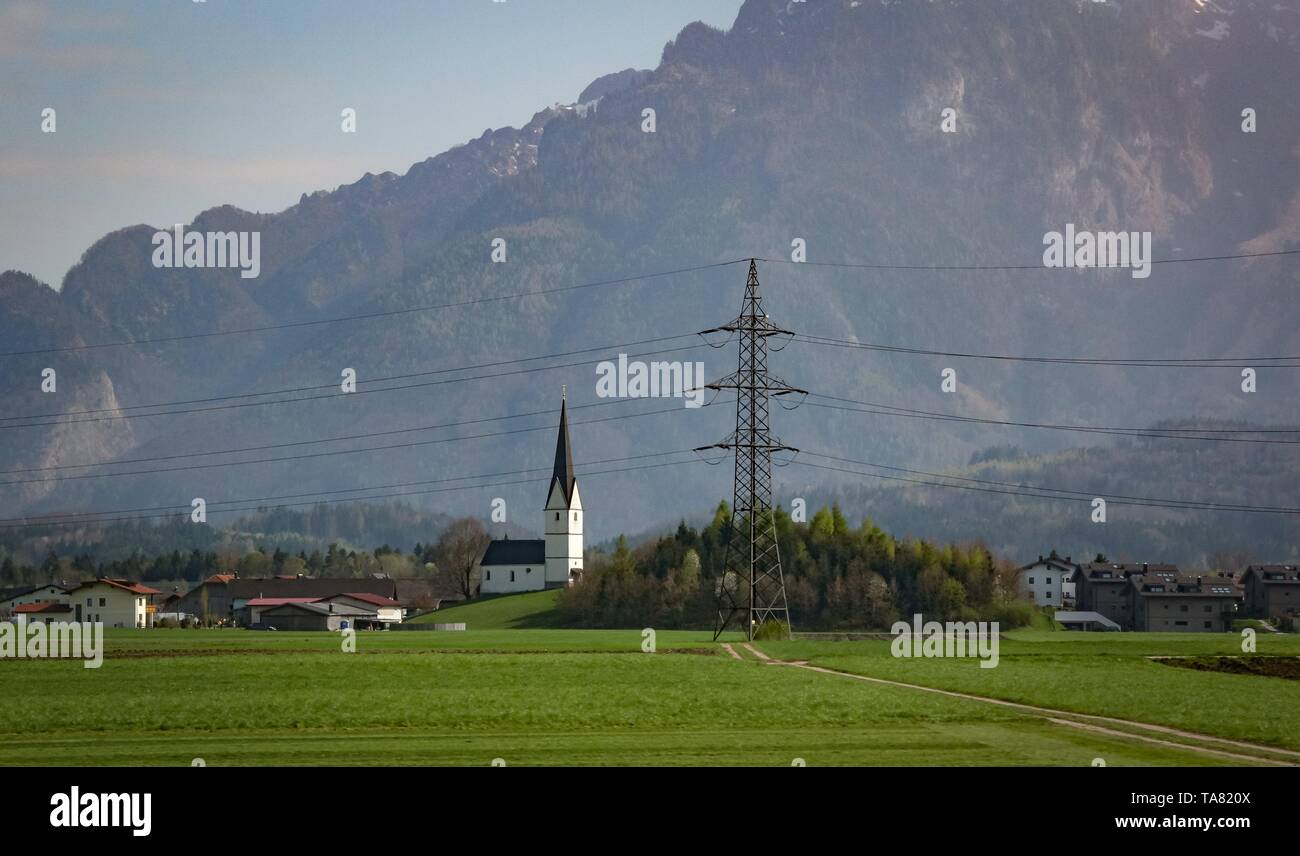 Snow disappearing in Austrian alps in the spring Stock Photo - Alamy