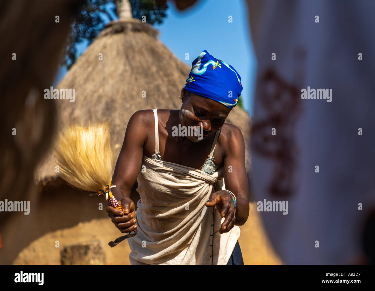 Dan tribe woman dancing with a fly-whisk during a ceremony, Bafing ...