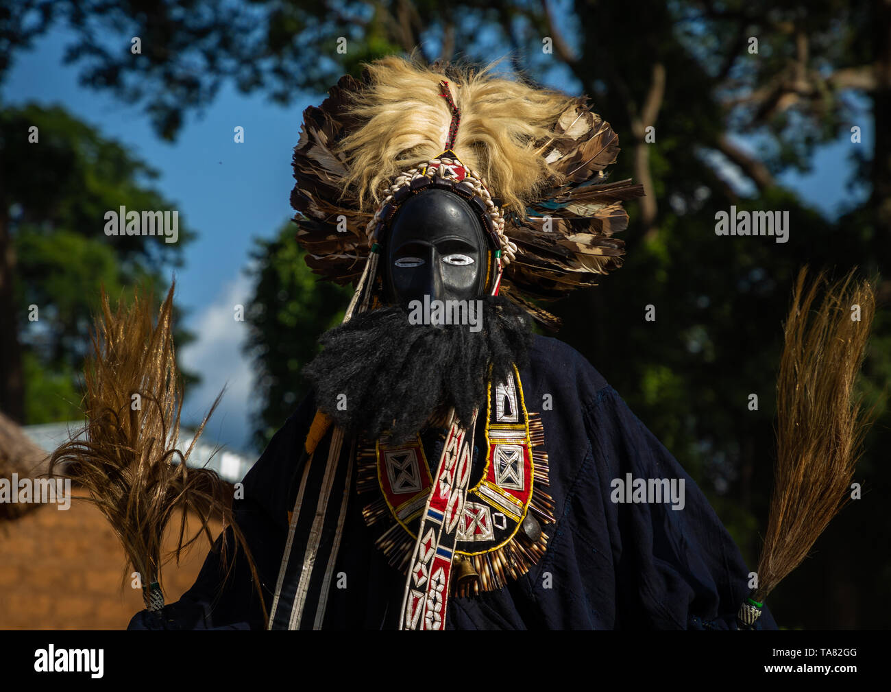Traditional african mask feathers hi-res stock photography and images ...