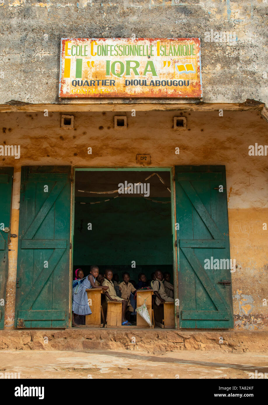 African children in a koranic school classroom, Tonkpi Region, Man ...