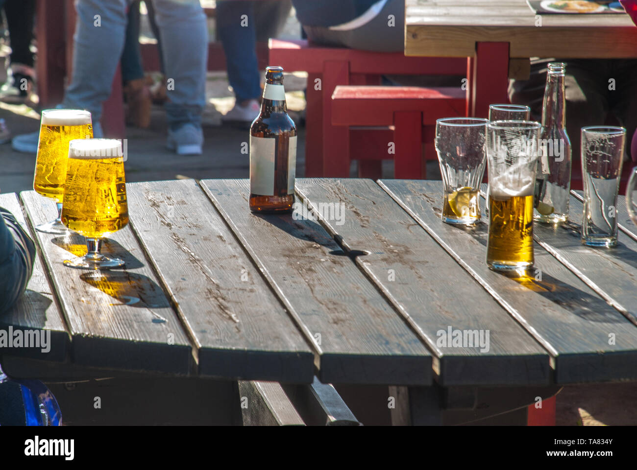 Excellent light beer on a wooden table On a nice day Suitable for ...