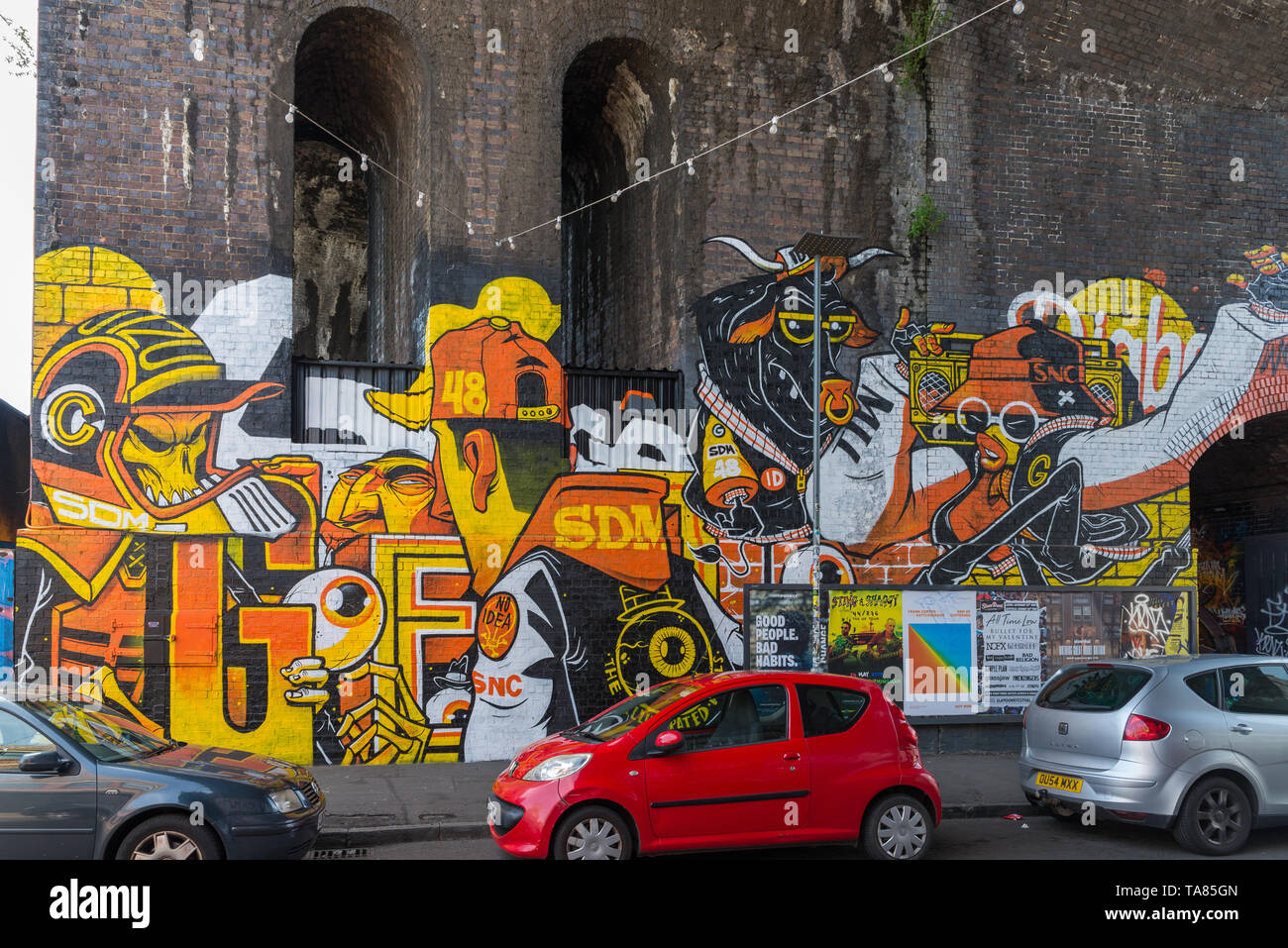 Street art and graffiti painted on the walls of railway arches in the ...