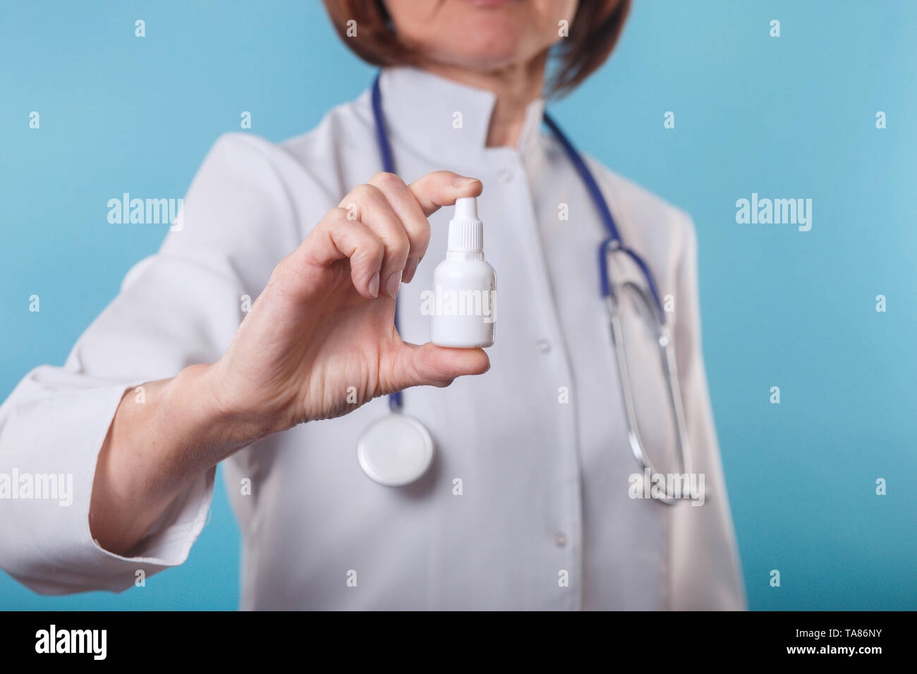 Doctor nose spray hi-res stock photography and images - Alamy