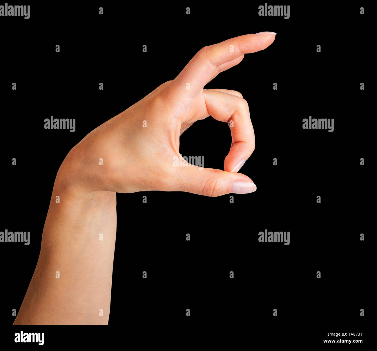 Female hand showing horns of animal or giving the devil horns gesture ...
