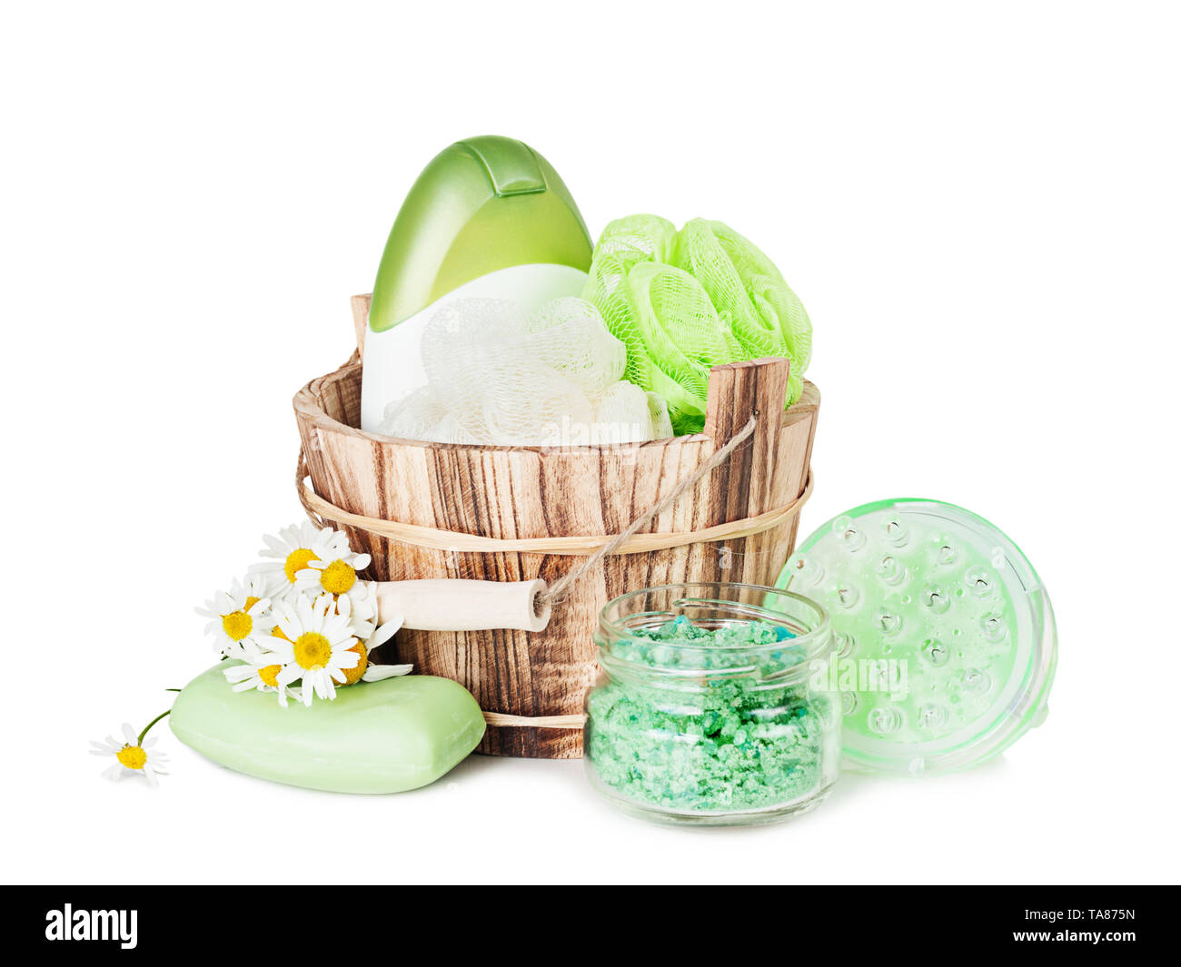 Toiletries of green color: natural soap, washcloths, shampoo, shower ...