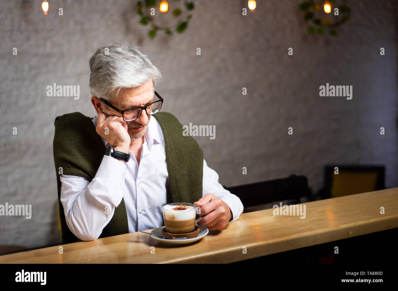 Old man coffee cafe hi-res stock photography and images - Alamy