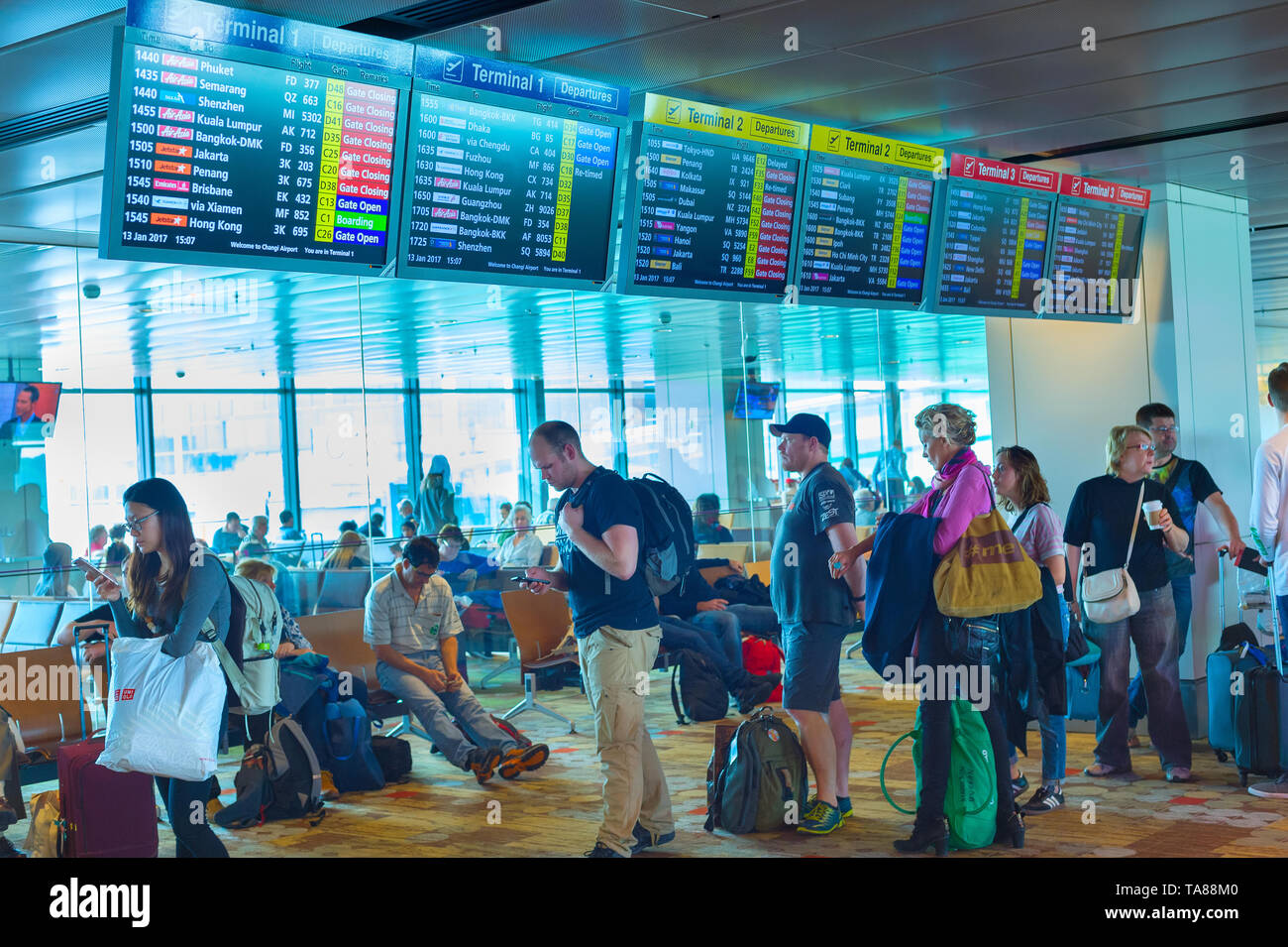 SINGAPORE - JANUARY 13, 2017: People waiting in queue at Changi ...