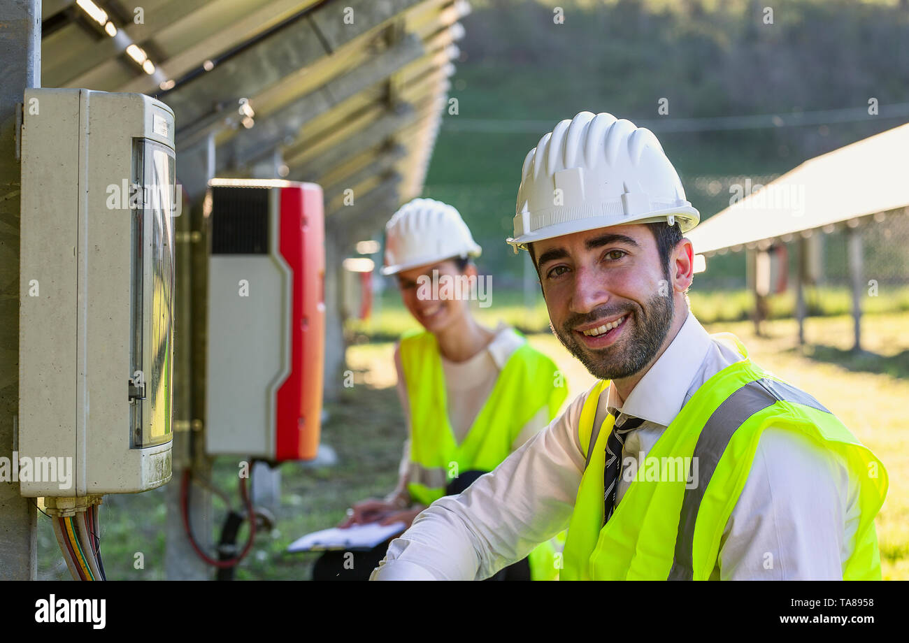 Engineers are testing the solar photovoltaic power generation Stock ...