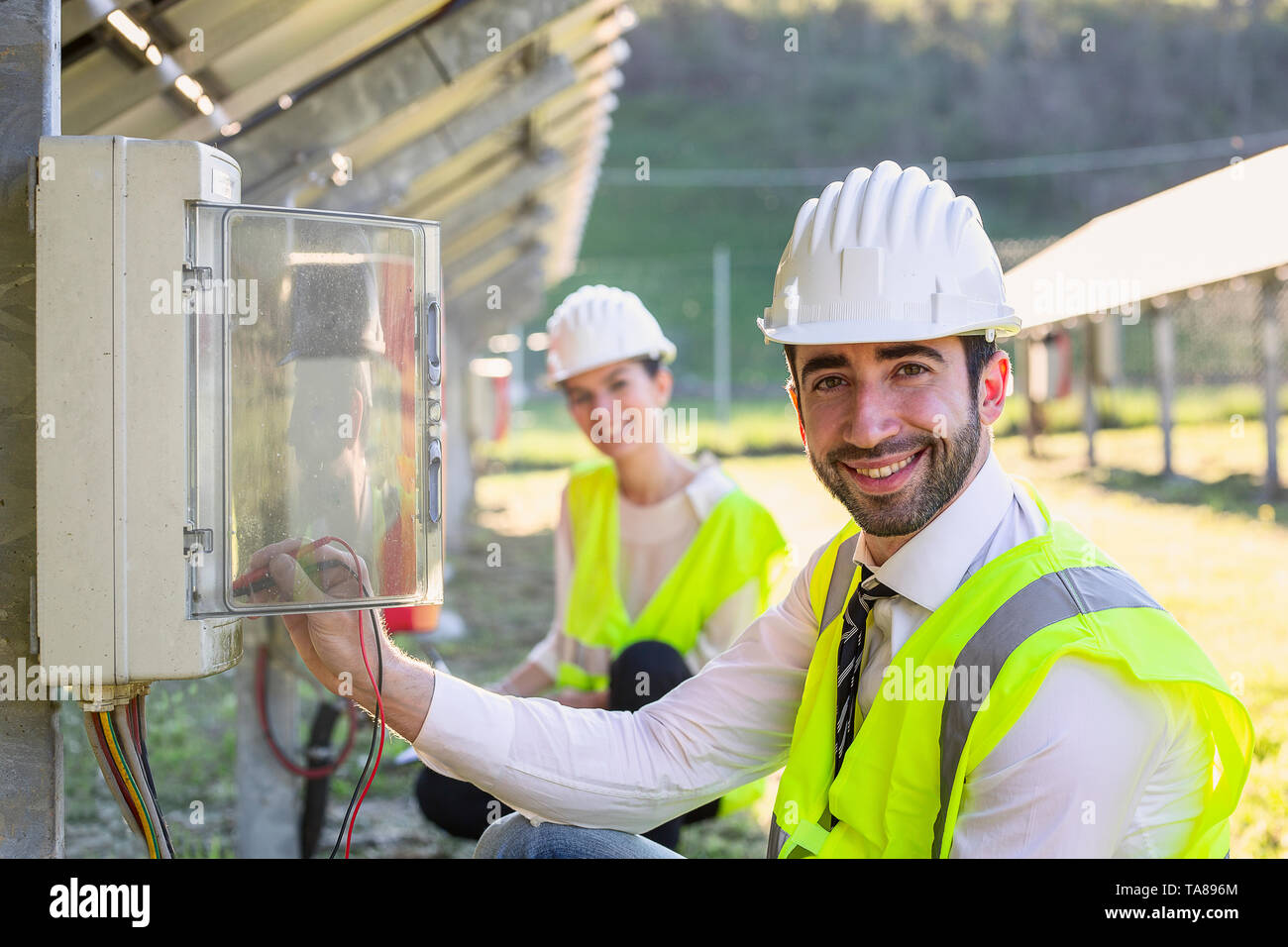 Engineers are testing the solar photovoltaic power generation Stock ...