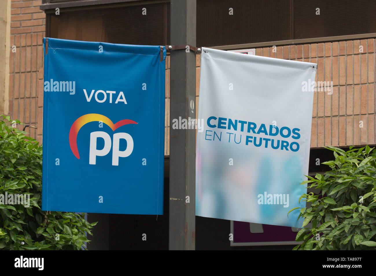 May 2019. Spain. Banners hanging in the street lights of the city for ...