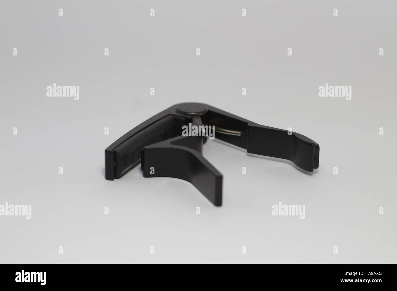 Guitar capos hi-res stock photography and images - Alamy