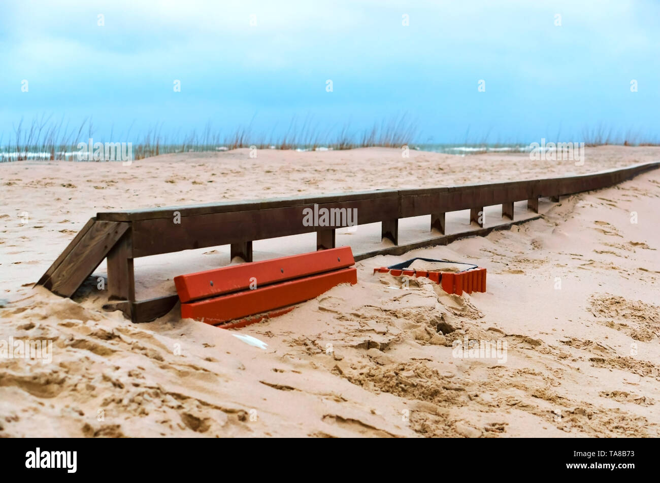 sand-covered promenade, sea promenade after storm, Yantarny village ...