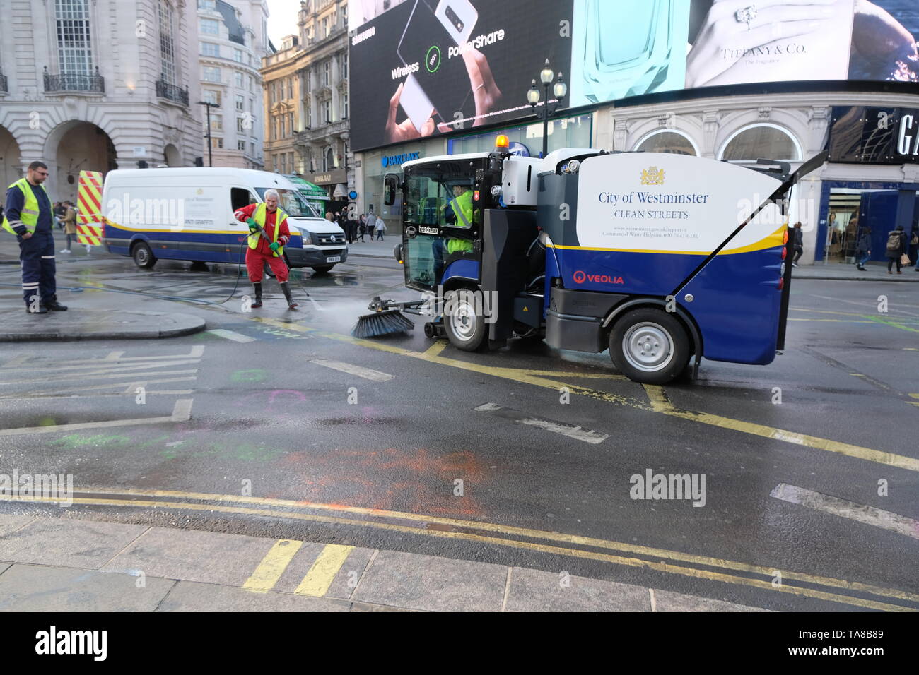 A big clean-up commences at Piccadilly Circus after Extinction ...