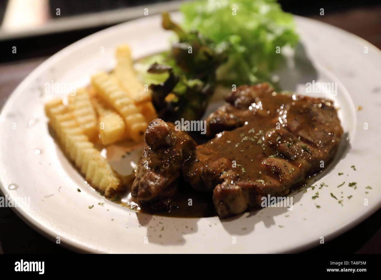 Beef steak in restaurant Stock Photo - Alamy