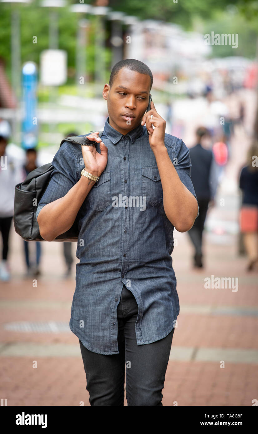 One african man walking alone hi-res stock photography and images - Alamy