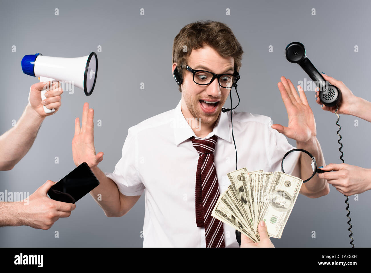 excited call center operator in headset near megaphone, smartphone ...