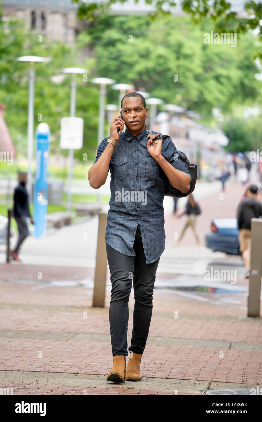 One african man walking alone hi-res stock photography and images - Alamy