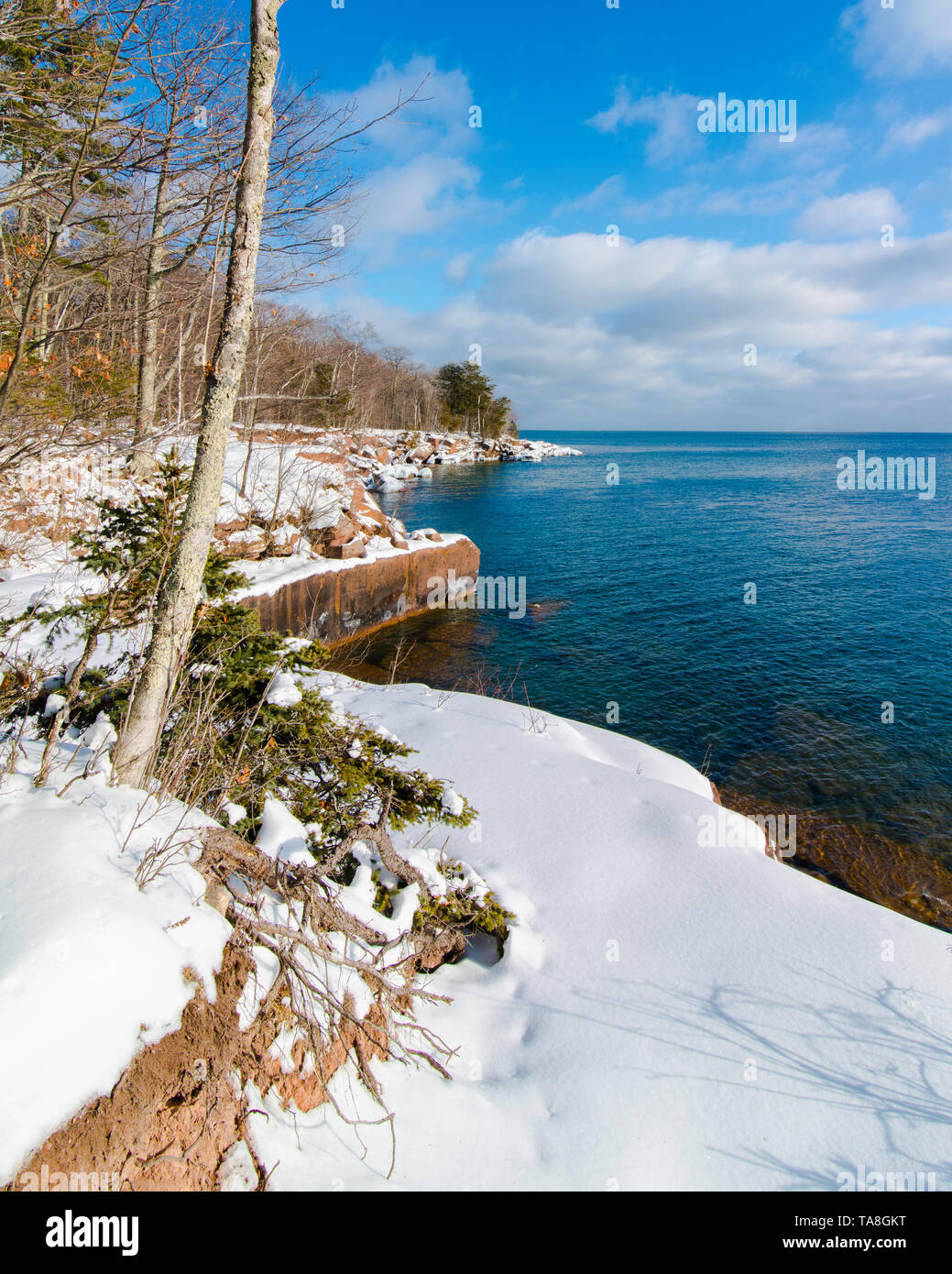 Beautiful trees and Lake Superior coastline in the cold and snow at Big ...