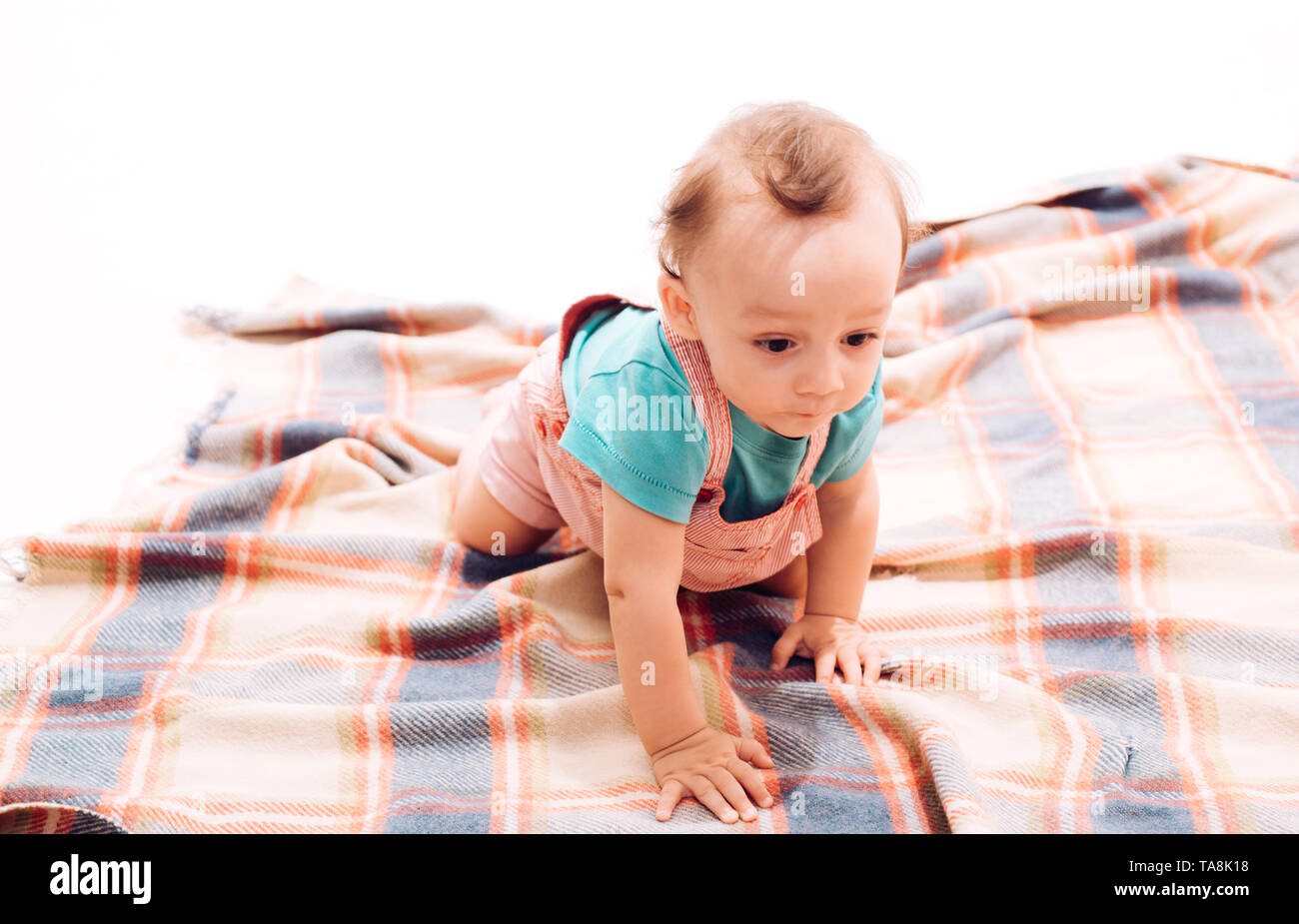 A crawling child. Adorable small baby. Cute baby crawl on floor ...