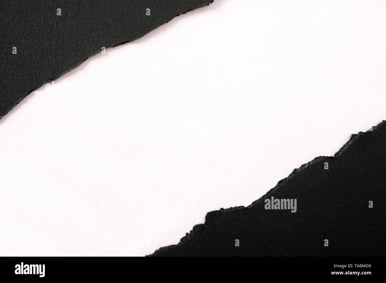 Torn black paper strip diagonal white background Stock Photo - Alamy