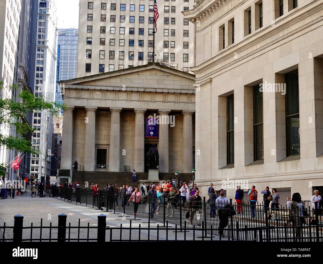 In front of Federal Hall and the New York Stock Exchange in the ...