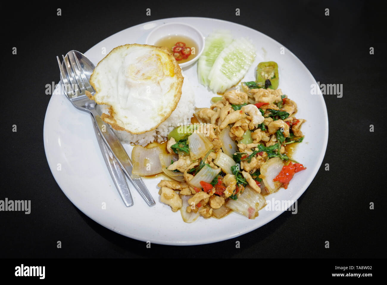 fried hot and spicy thai food / stir fried holy basil chicken slice ...