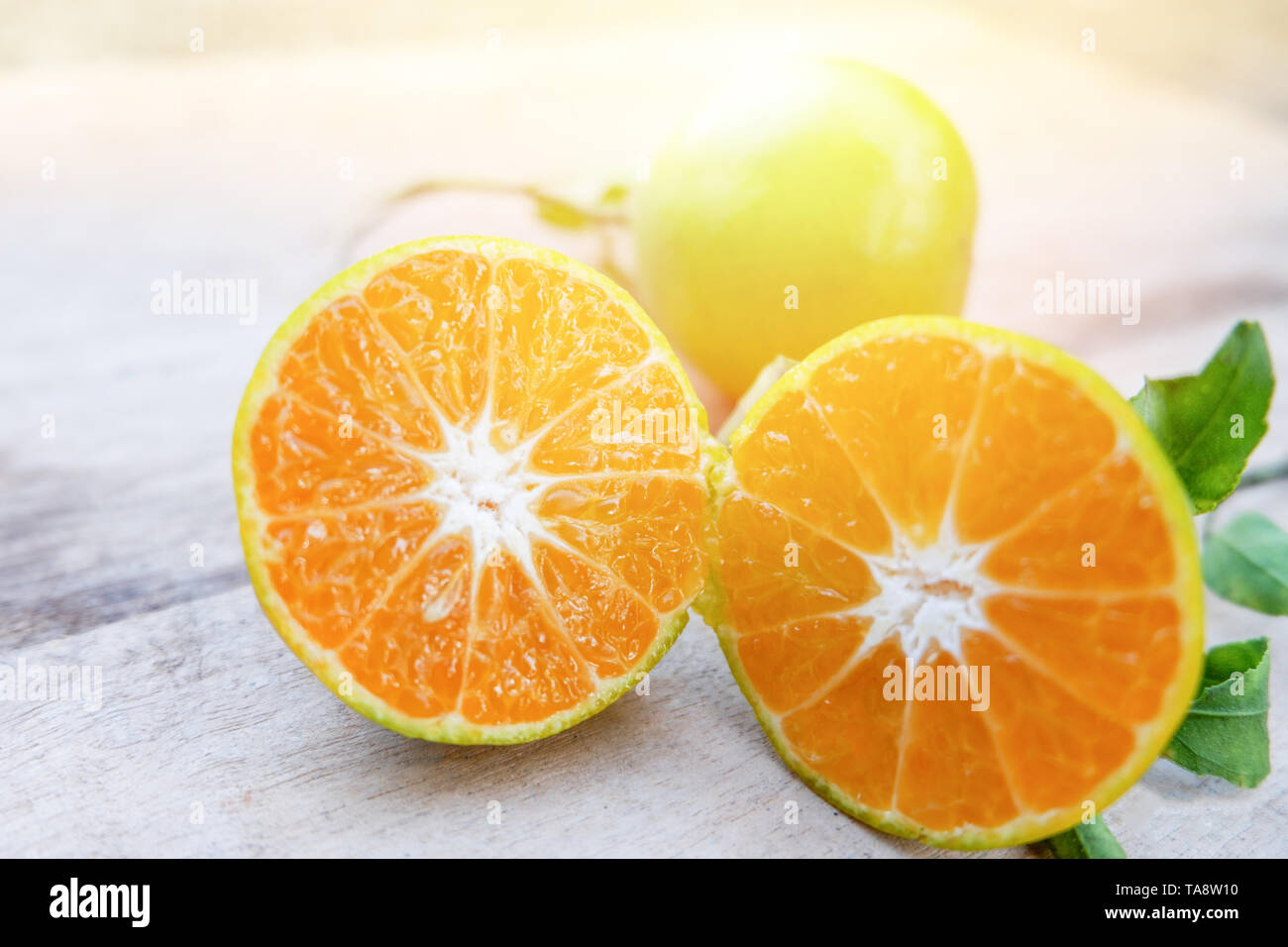 Fresh Orange / Slice Cut half orange fruit harvest from the garden with ...