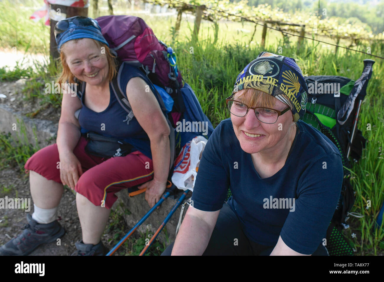 Spain, pilgrims resting along the St.James Walk toward Pontevedra ...