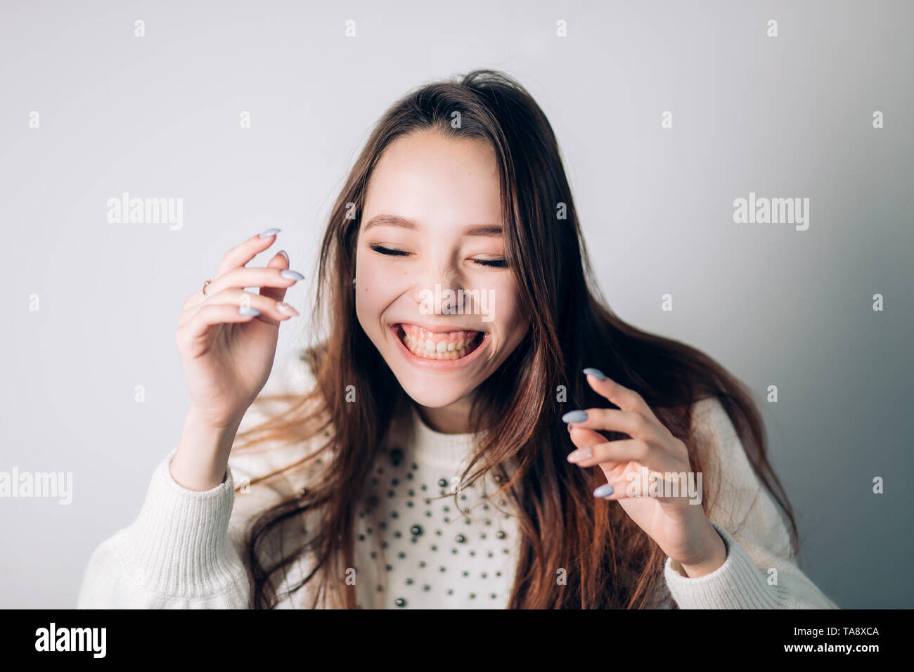 Smiling happy woman. Young beautiful girl laughing with eyes closed ...