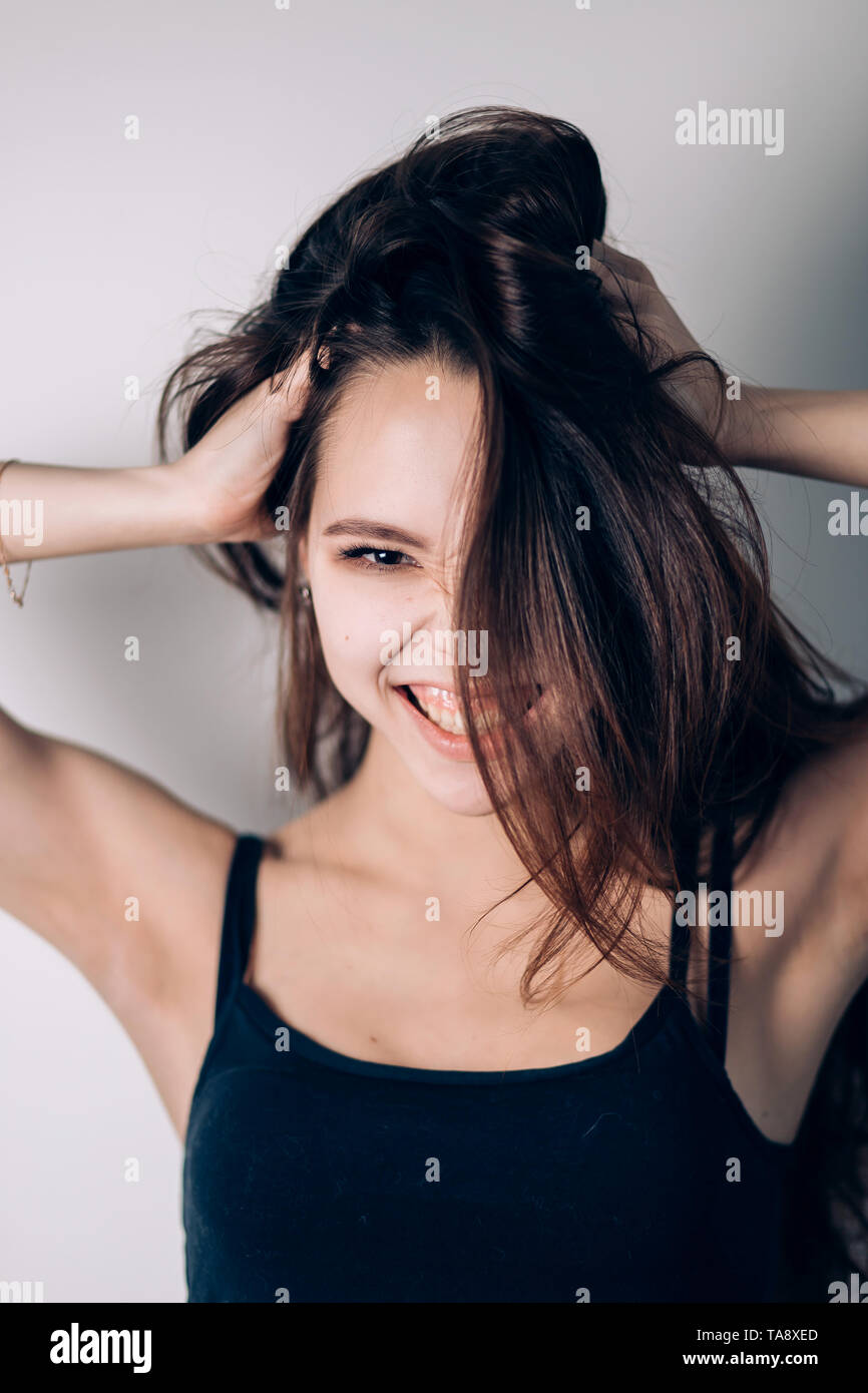 Smiling happy woman. Crazy girl on white background Stock Photo - Alamy
