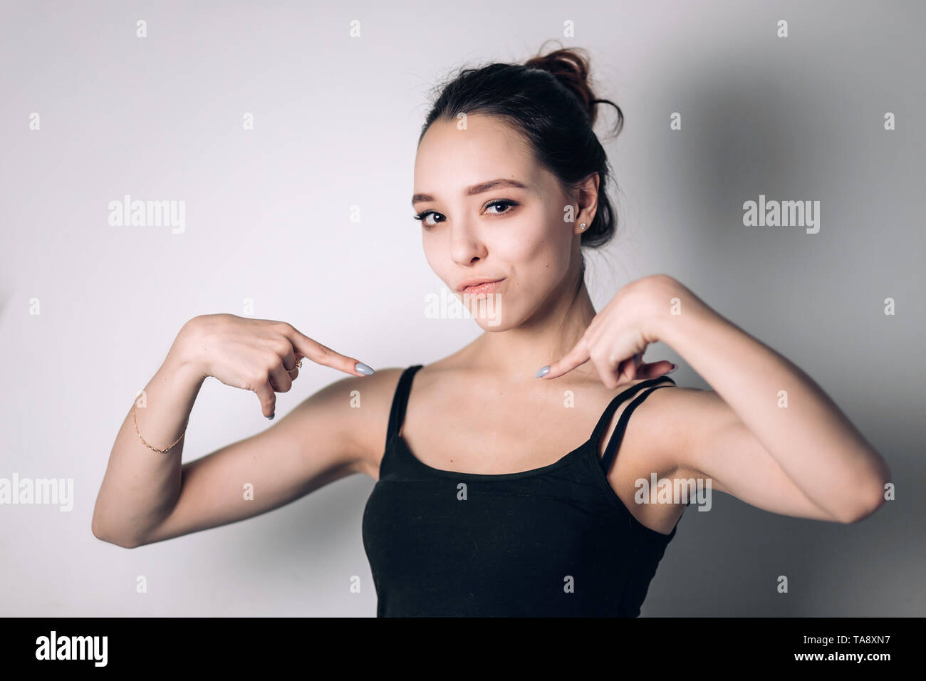 woman pointing herself. Beautiful girl proud of himself Stock Photo - Alamy