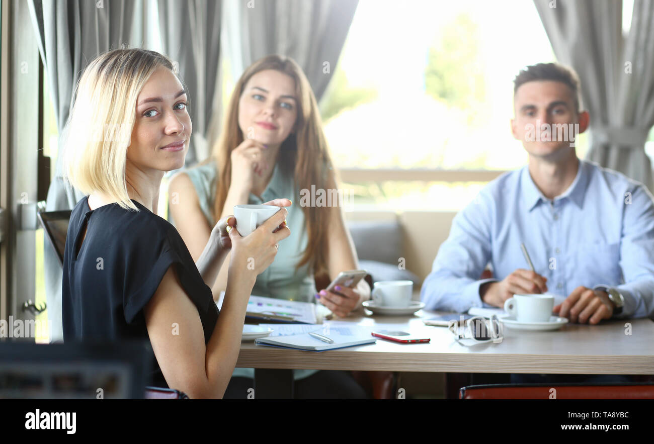 Group of people sitting in cafe Stock Photo - Alamy