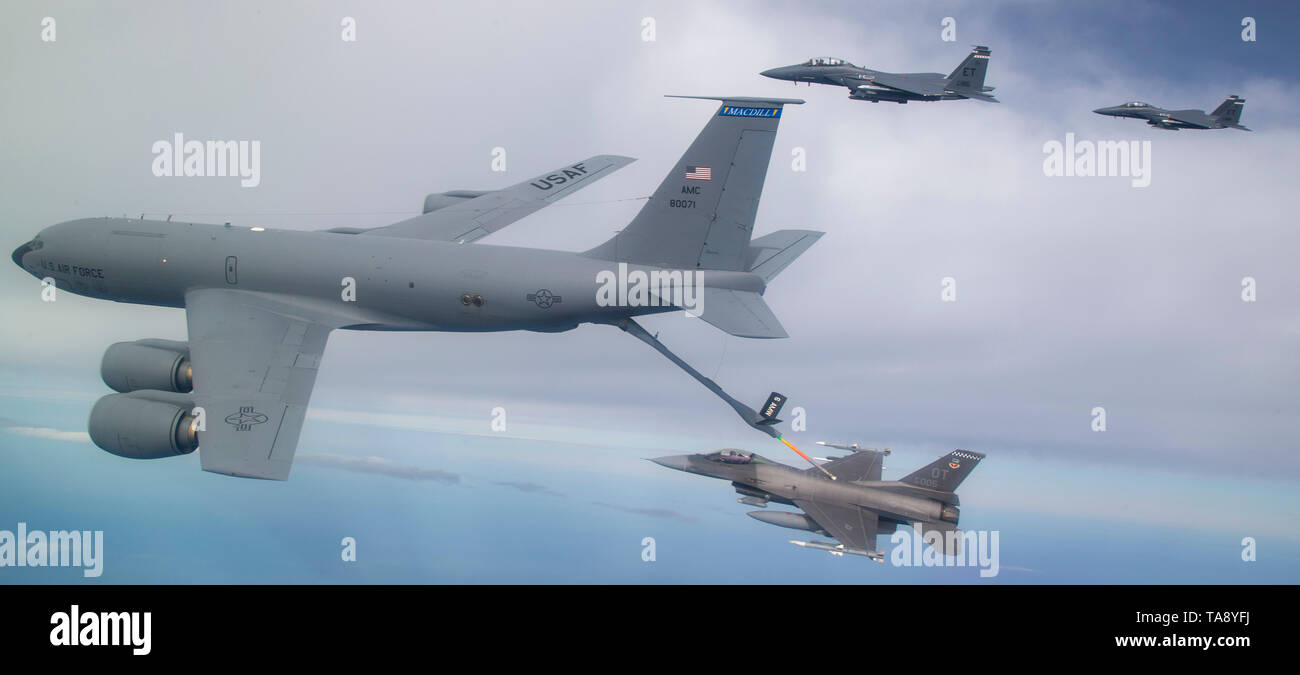 An F-16C Fighting Falcon and two F-15E Strike Eagles from the 85th Test ...