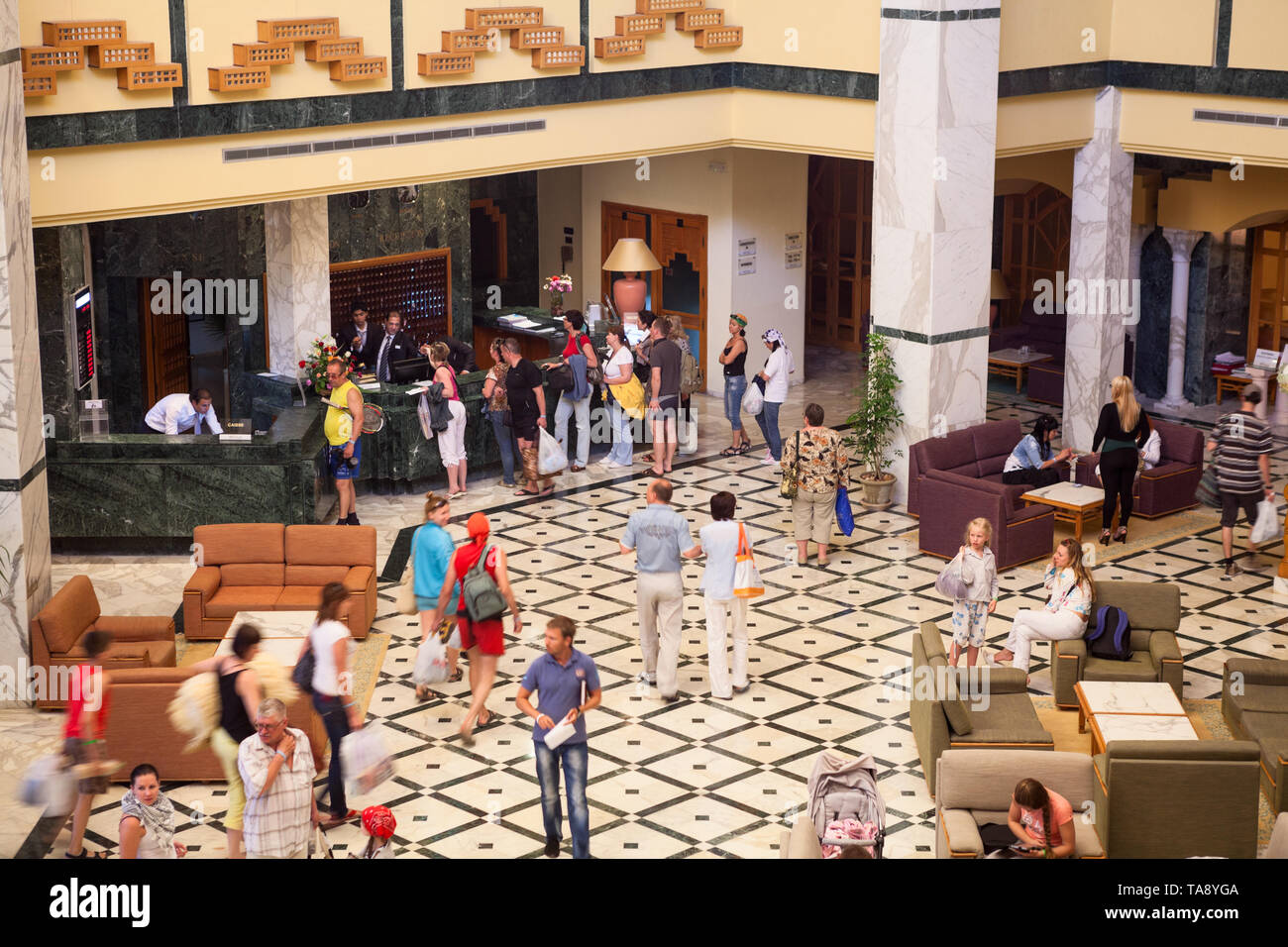 Luxury hotel lobby reception people hi-res stock photography and images ...