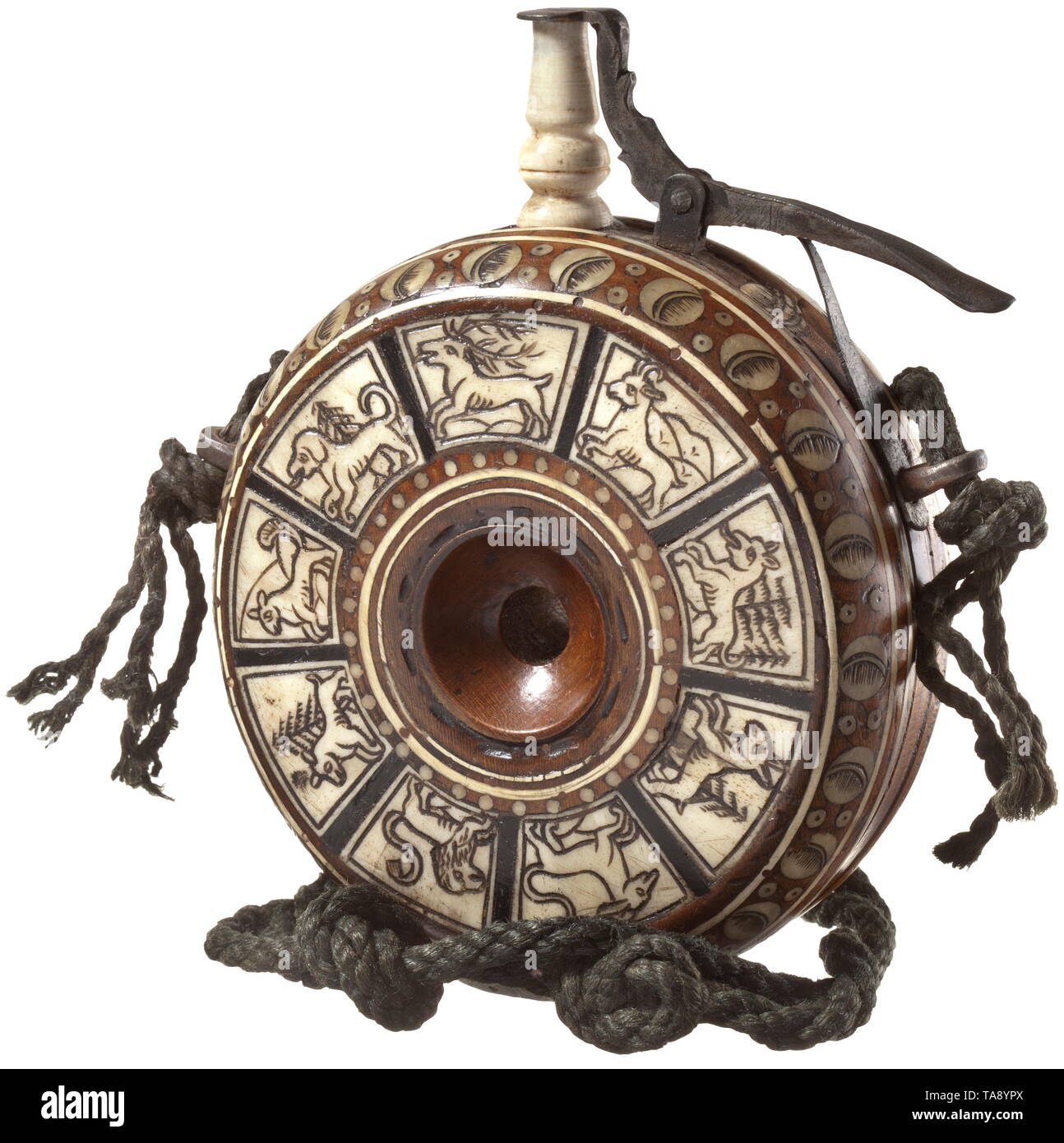 A German bone-inlaid powder flask, circa 1620 Round wooden flask with ...