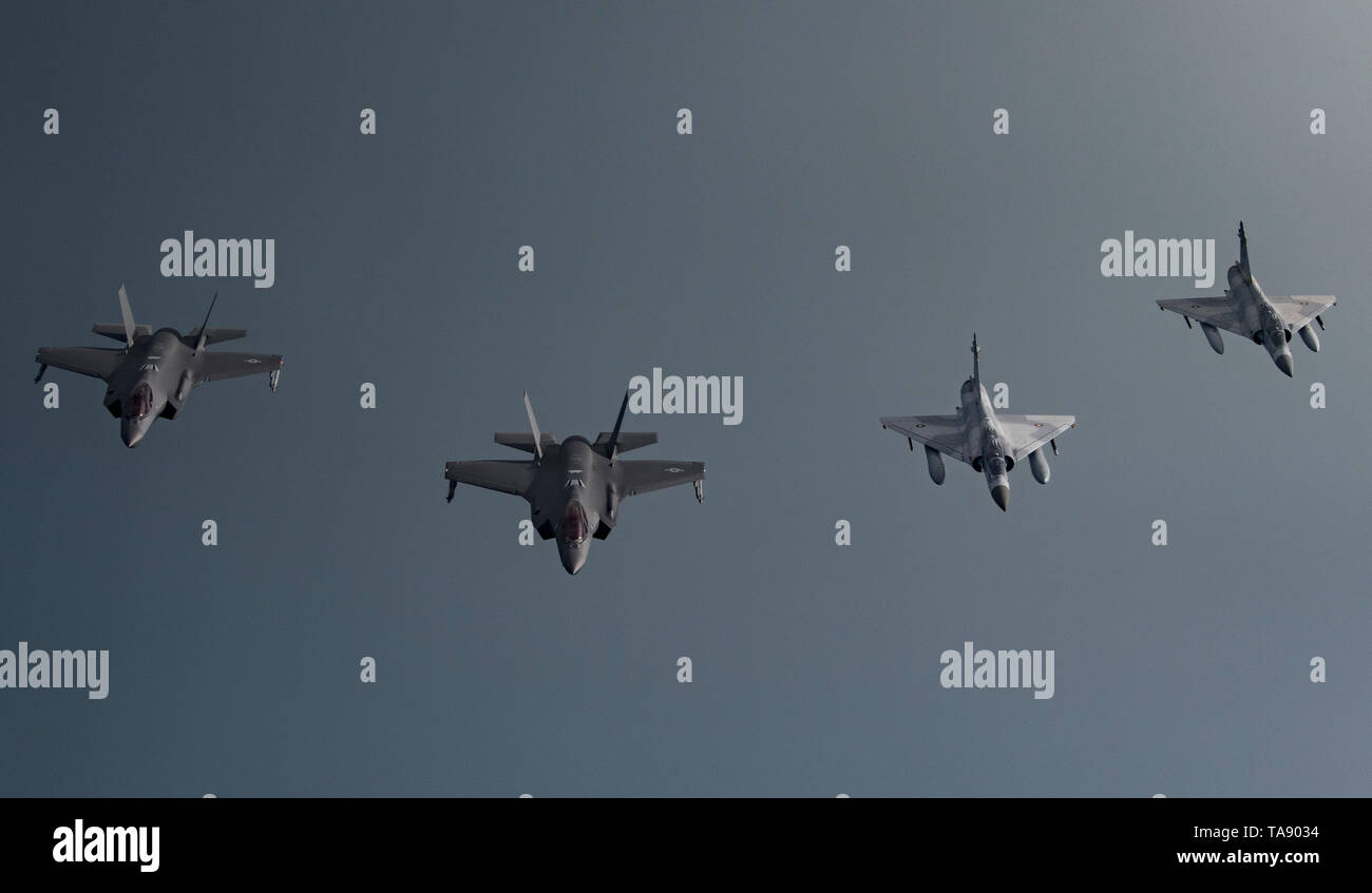 Qatar Emiri Air Force (QEAF) Mirage 2000s and U.S. F-35A Lightning IIs ...