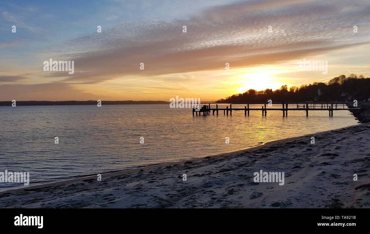 Sunset in Kollund in Denmark Stock Photo - Alamy