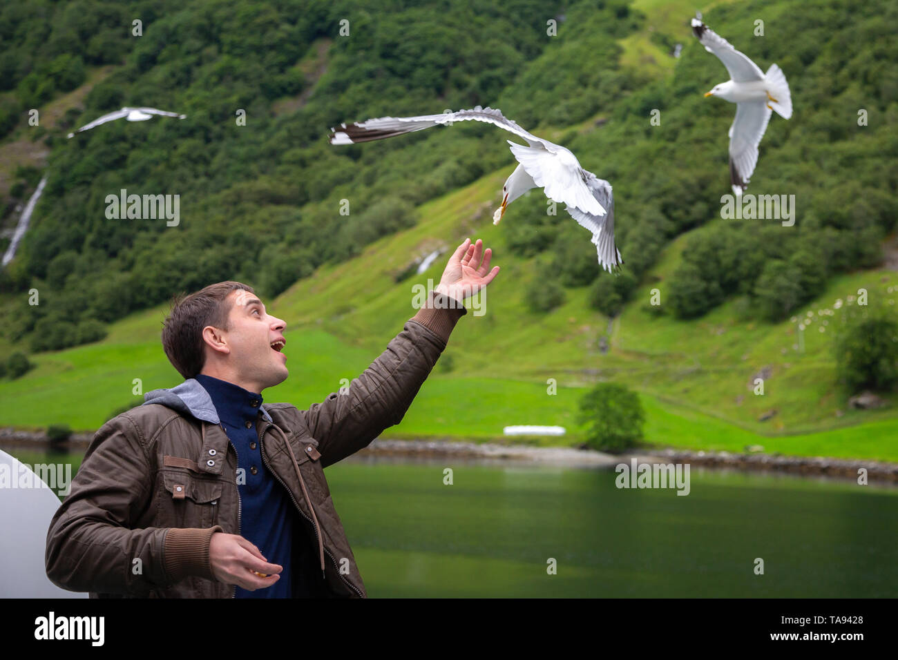 Young man on ferry boat hi-res stock photography and images - Alamy