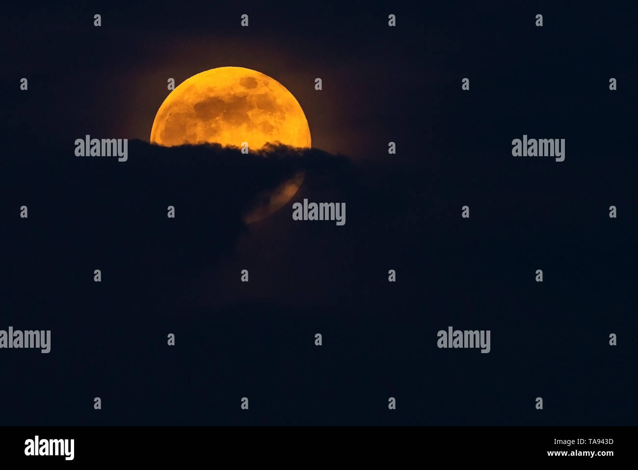 Bright Yellow Full Moon in clouds. Nature skyscape Stock Photo - Alamy