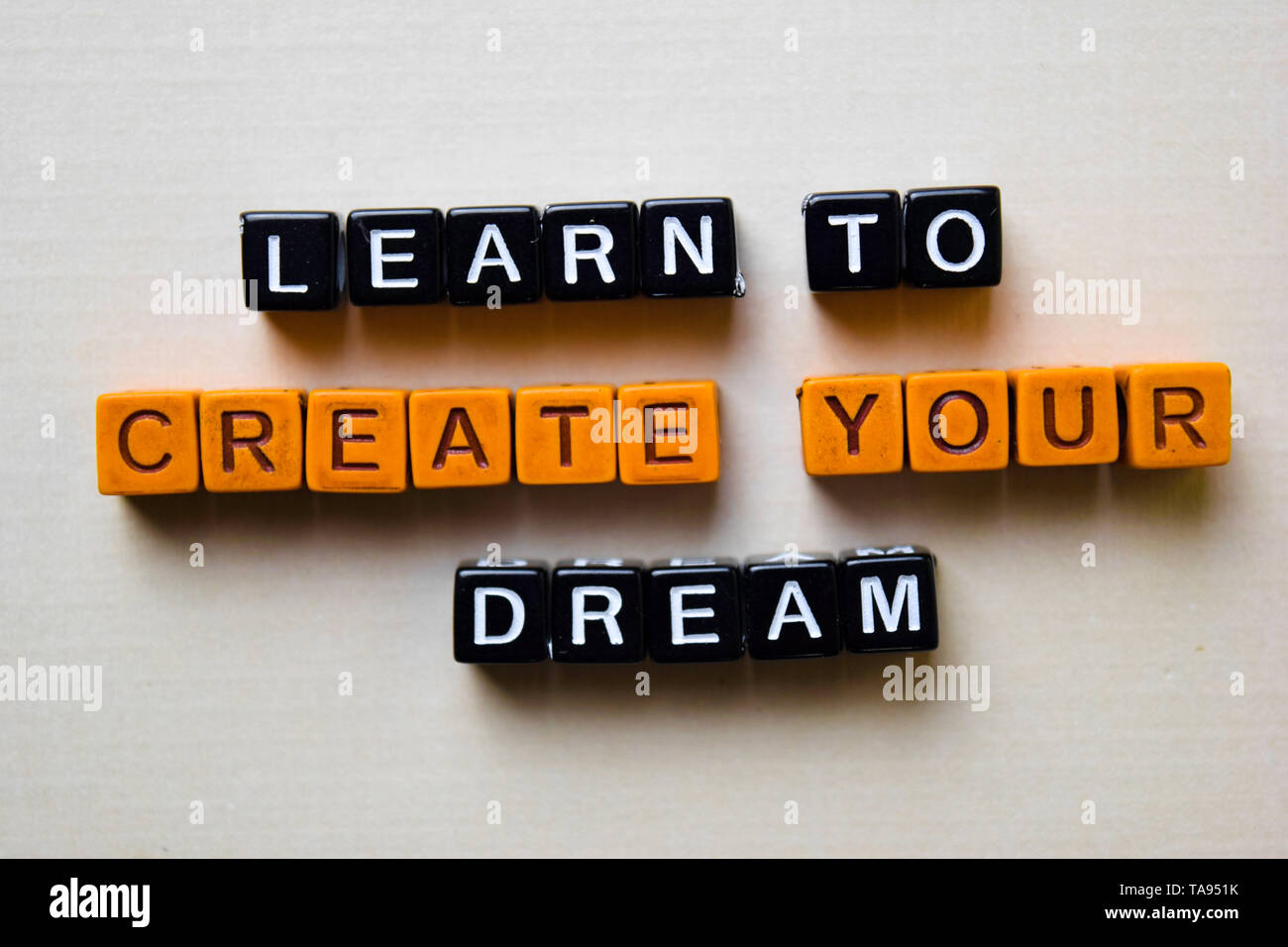 Learn to Create Your Dream on wooden blocks. Business and inspiration ...