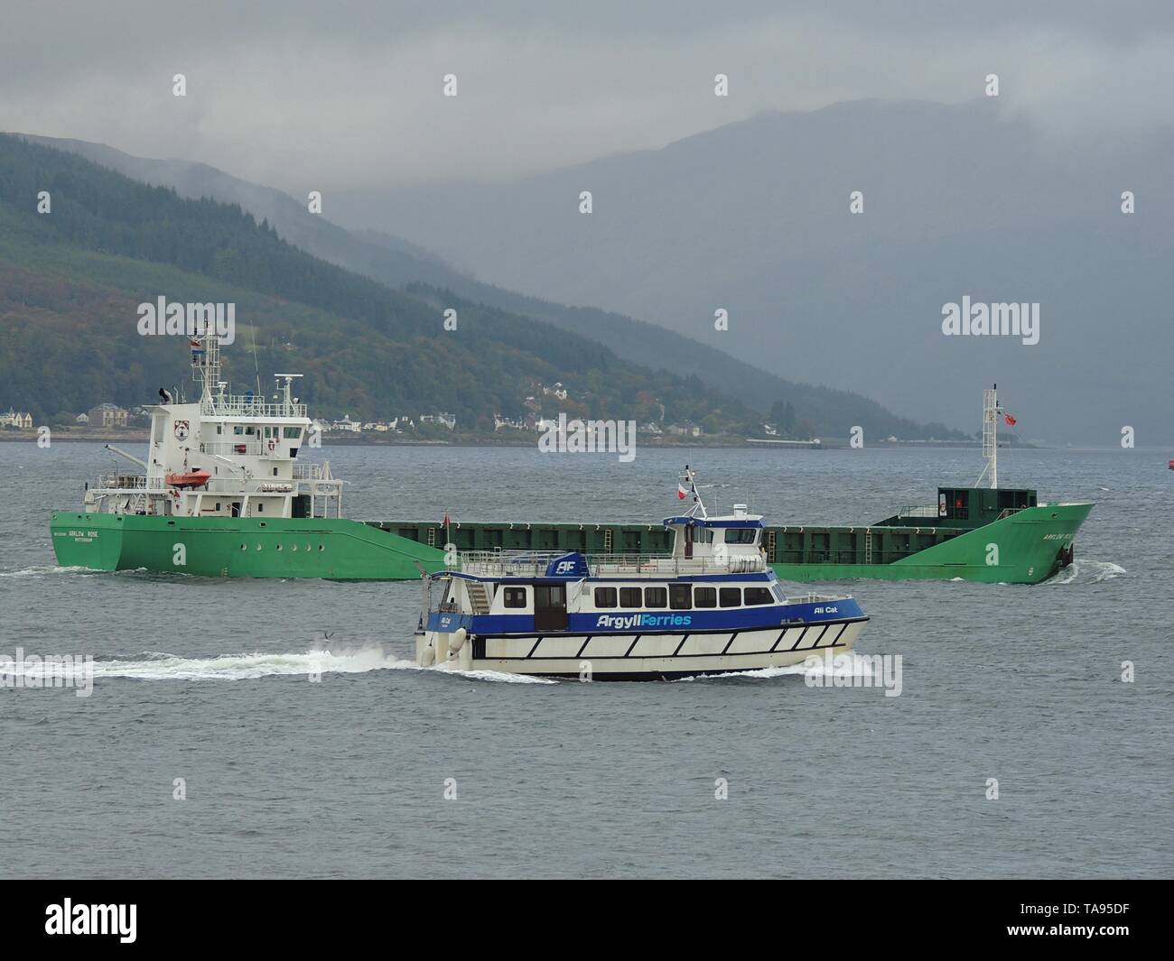 The passenger ferry MV Ali Cat, passes the general cargo vessel Arklow ...
