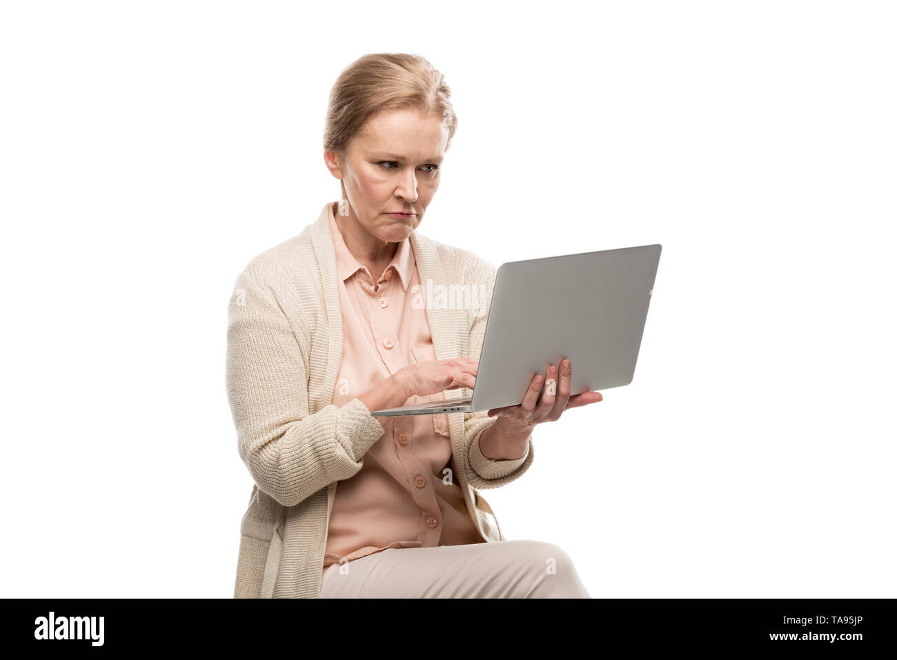 confused middle aged woman using laptop Isolated On White Stock Photo ...