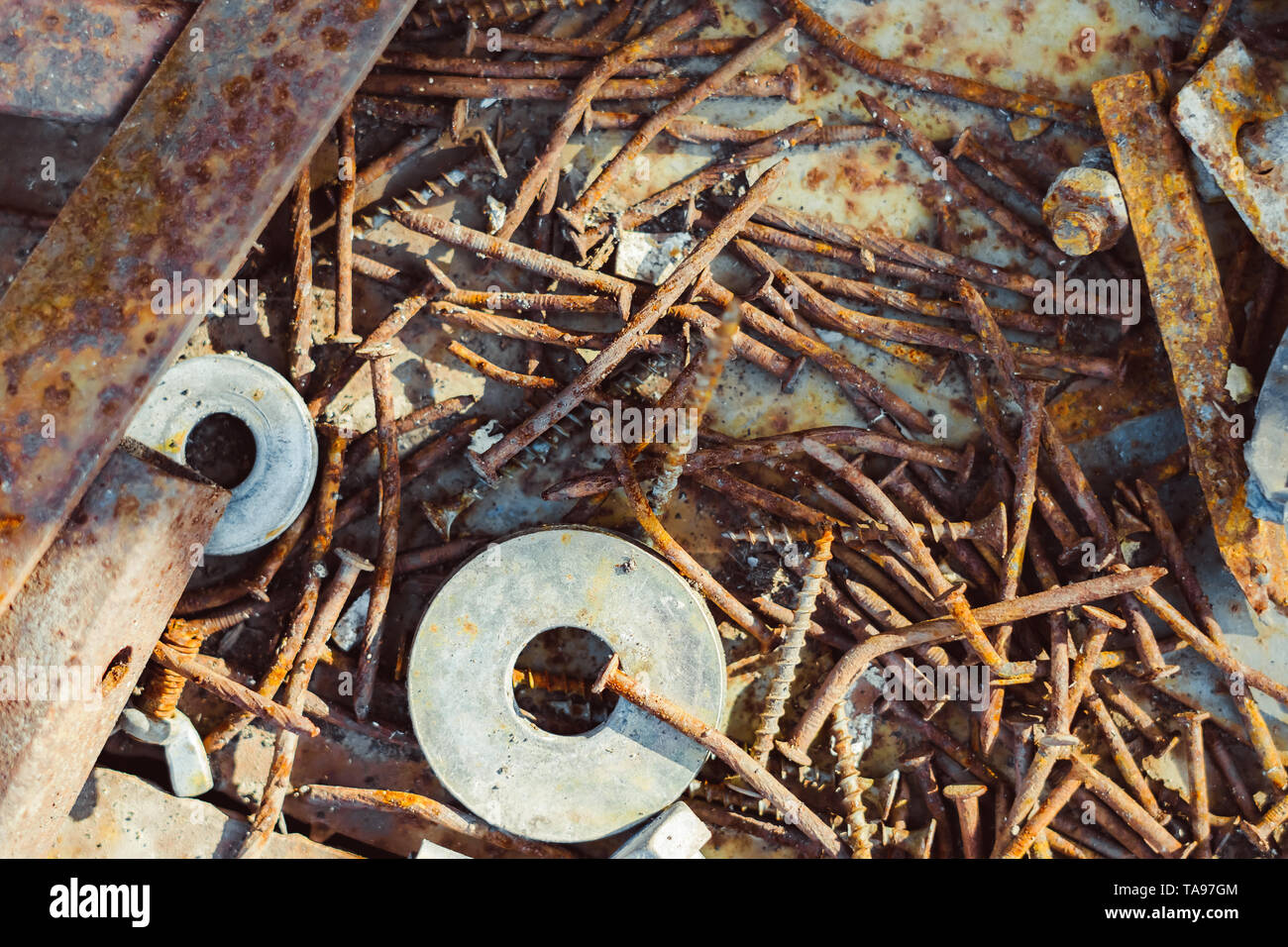 Pile of old rusty screw heads, bolts, metal nuts, isolated Stock Photo ...