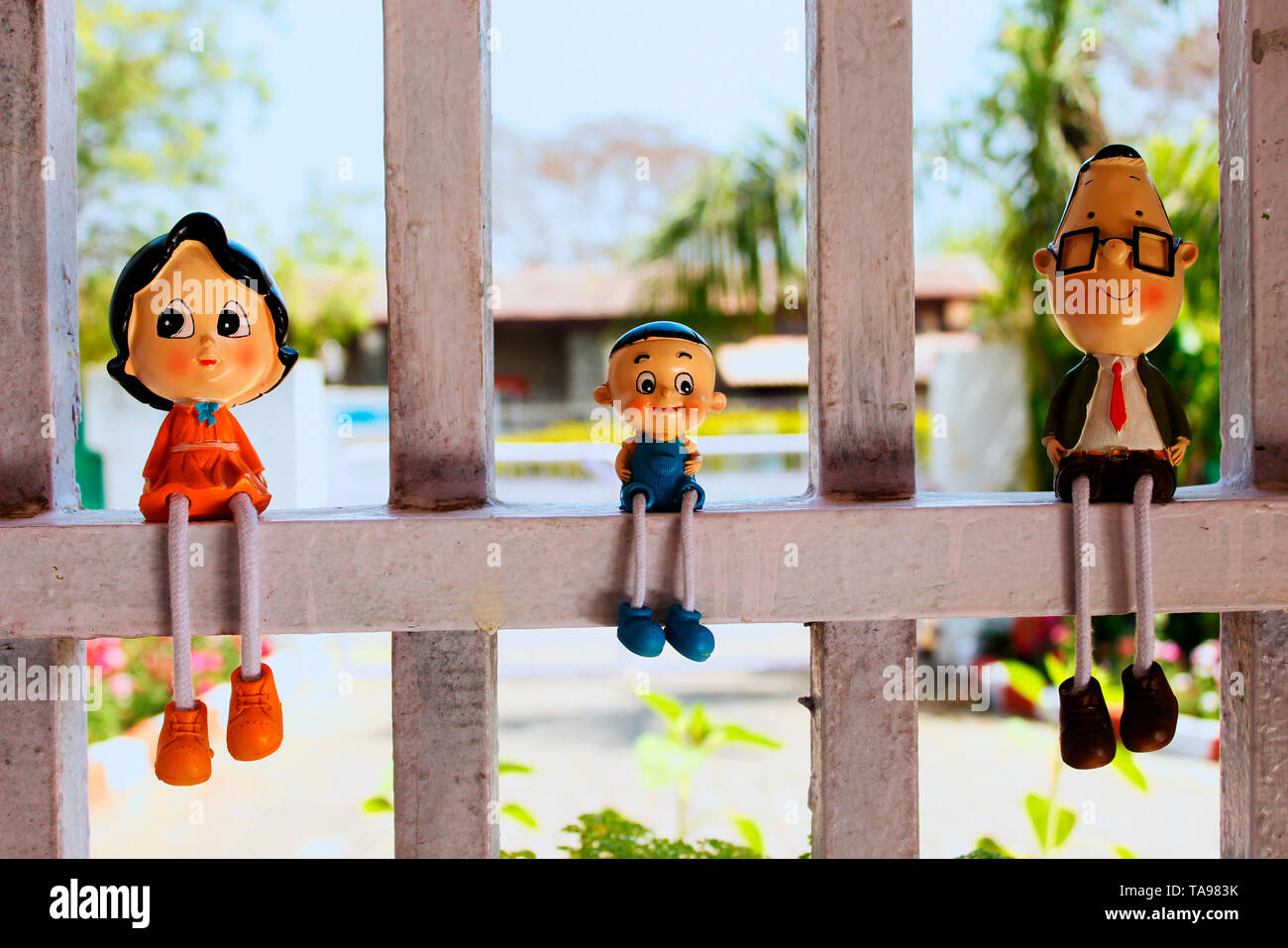 Toy miniatures on window Stock Photo - Alamy