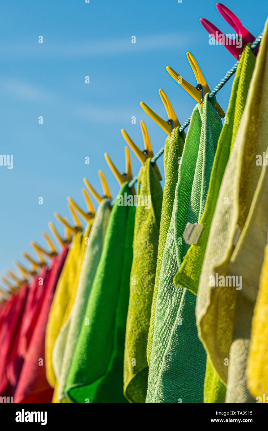 Microfibre cleaning cloths on a washing line Stock Photo - Alamy